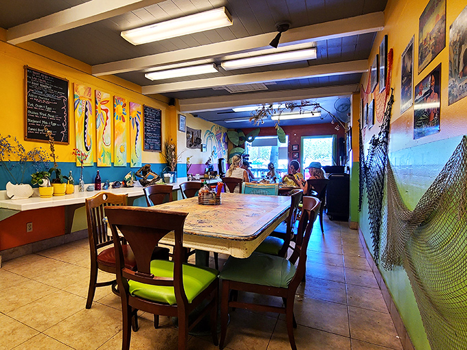 Step into a kaleidoscope of color! This vibrant interior is like a warm hug from your favorite Hawaiian aunt, inviting you to sit and stay awhile.