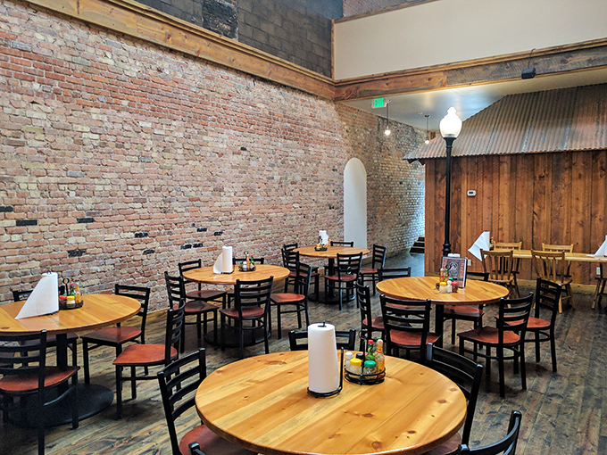 Step into a time machine disguised as a pizzeria. The rustic interior blends modern comfort with old-world charm, making you feel instantly at home.