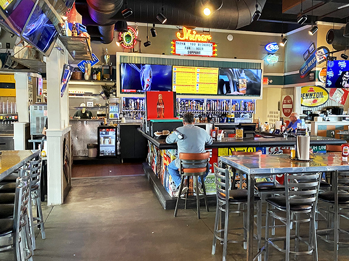 Step inside and feast your eyes! This isn't your grandpa's garage &ndash; unless your grandpa had impeccable taste in both cars and cuisine.