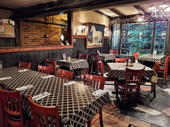 Cozy nooks and crannies galore! This dining room whispers tales of yesteryear while promising delicious adventures to come. Can you smell the wings already?