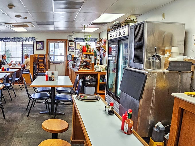 No-frills interior where magic happens. The wooden counter stools have witnessed decades of "first bite" expressions that words can't adequately describe.