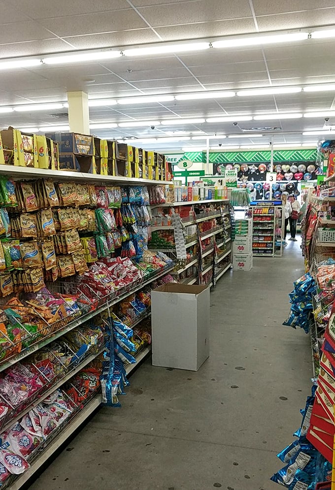 Snack heaven beckons down this well-stocked aisle, where colorful packages contain treats that cost less than the change hiding in your couch cushions.