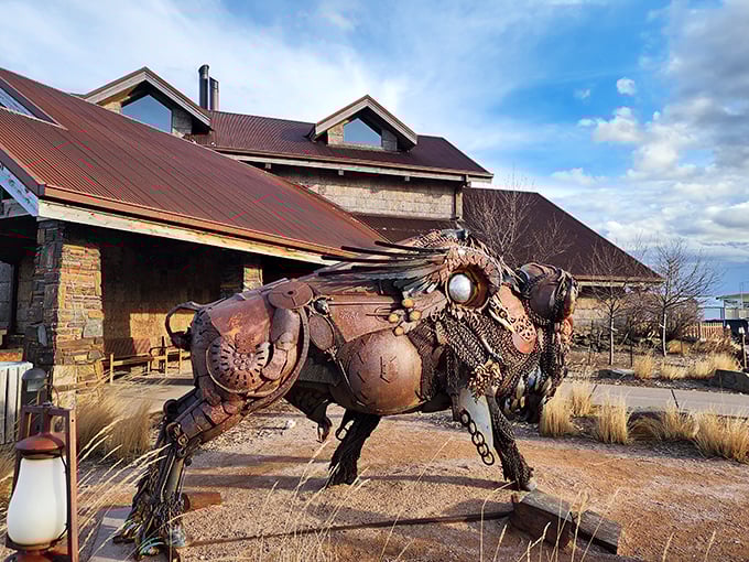 Holy cow! This metal bison guards flavor country. Dakotah Steakhouse's rustic charm is as big as its portions.