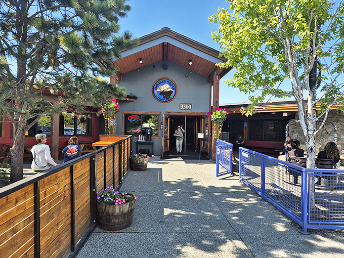 Moose's Tooth: Where pizza dreams come true! This cozy cabin-meets-brewpub exterior promises a slice of Alaskan heaven inside.