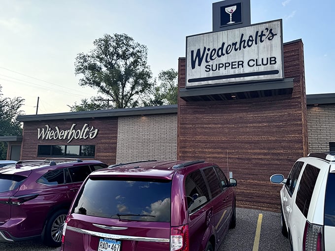 Wiederholt's neon sign glows like a beacon for steak lovers. It's not just dinner; it's a delicious trip back in time.