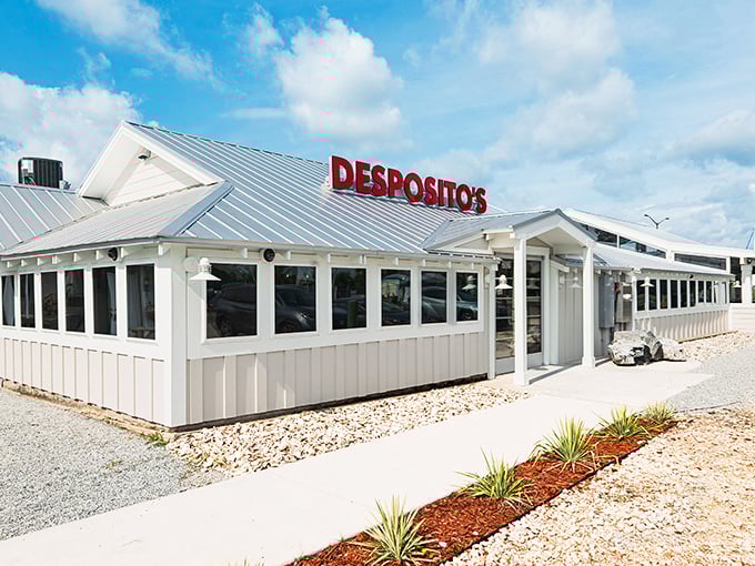 Anchors aweigh! This unassuming spot is where seafood dreams come true, and giant crab sculptures stand guard over flavor paradise.