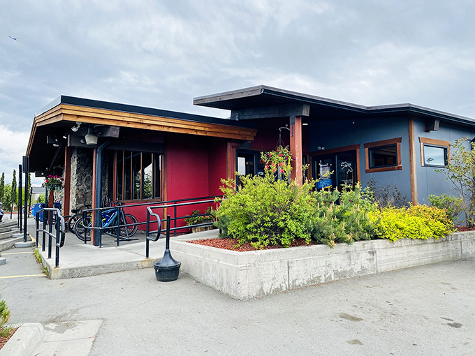 Step into flavor town! Moose's Tooth's inviting patio is the perfect spot to savor a gourmet pie and soak up the midnight sun.