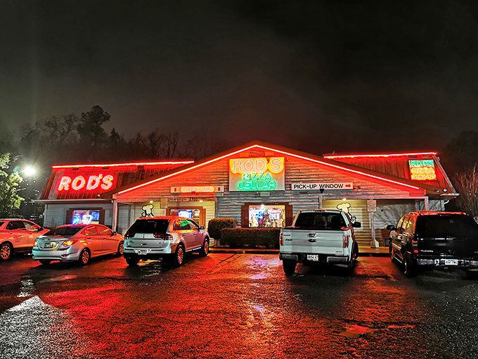 By day, a rustic retreat. By night, a neon-lit pizza paradise. Rod's Pizza Cellar is serving up slices with a side of small-town charm.