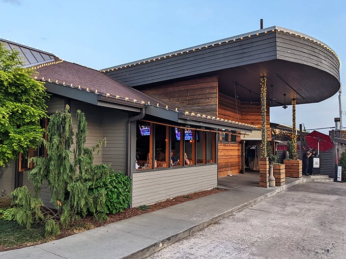  String lights and wood paneling create an atmosphere that whispers, "Welcome to the fanciest barn party you've ever attended!"