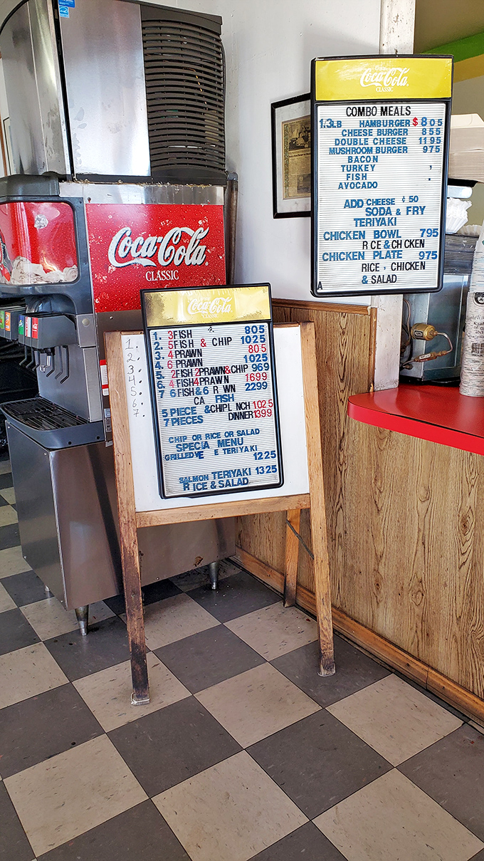 Decisions, decisions! This menu board is like a treasure map for your stomach, with X marking the spot for burger gold.