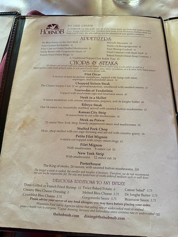 Decisions, decisions! The HobNob's menu is a carnivore's dream, offering everything from Filet Oscar to the king of steaks - a 24-ounce Porterhouse that could feed a small village.