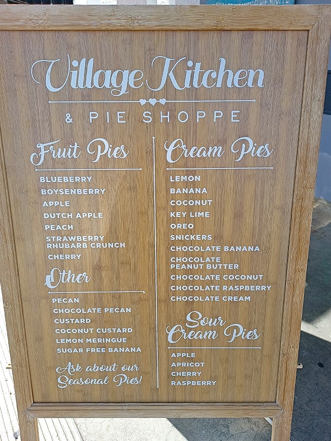 Decisions, decisions! This menu board is a sweet tooth's dream come true, offering a dizzying array of pie possibilities.
