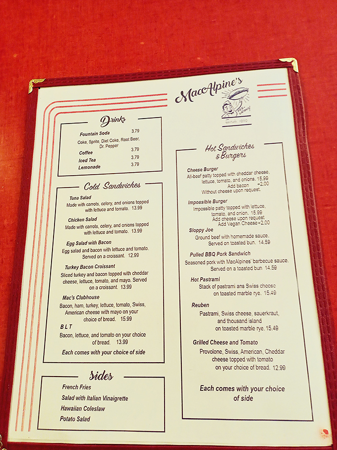 Decisions, decisions! MacAlpine's menu is a delightful trip down memory lane, offering everything from classic burgers to the intriguingly named "Impossible Burger." Choose your own adventure!