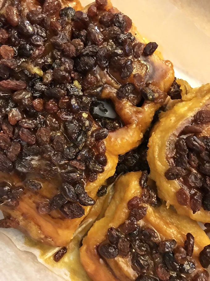 Raisins on a roll! These cinnamon-swirled beauties are so packed with flavor, they might just dance right off your plate.