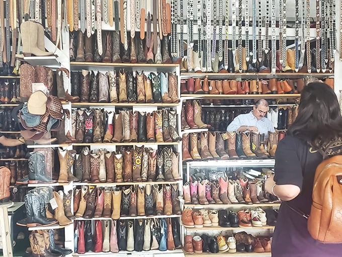 Boot heaven or leather lover's dream? This stall's got more kicks than a line-dancing convention, with belts to match every buckle fantasy.