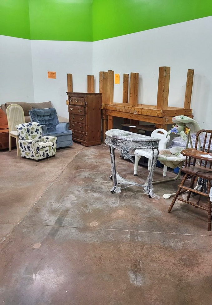 Yesterday's living room furnishings await tomorrow's first apartment. That wooden dresser probably has stories to tell spanning several decades of Missouri family life.