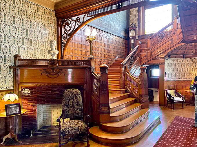 This staircase isn't just grand, it's Broadway-musical-opening-number grand. I half expect to see dancers twirling down those polished steps.