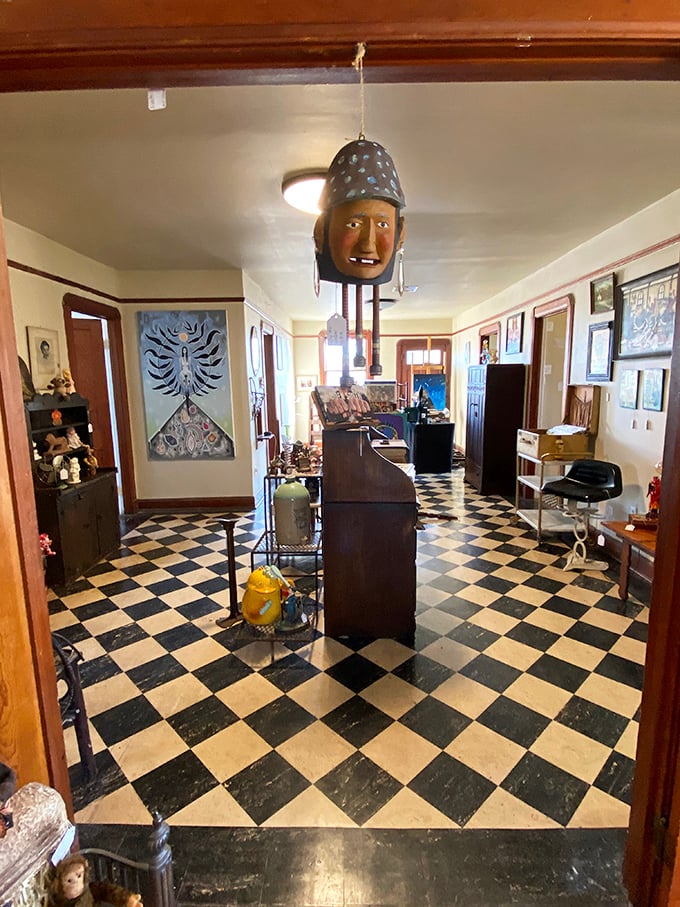 Checkered floors and hanging oddities &ndash; it's like Alice in Wonderland meets your eccentric aunt's attic. Curiouser and curiouser!