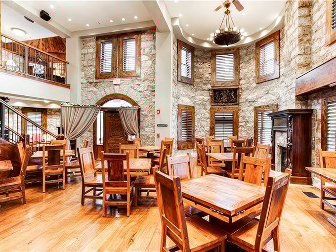 Forget drafty medieval halls - this great room blends rustic charm with cozy comfort. Knights of the Round Table, meet Netflix and chill.