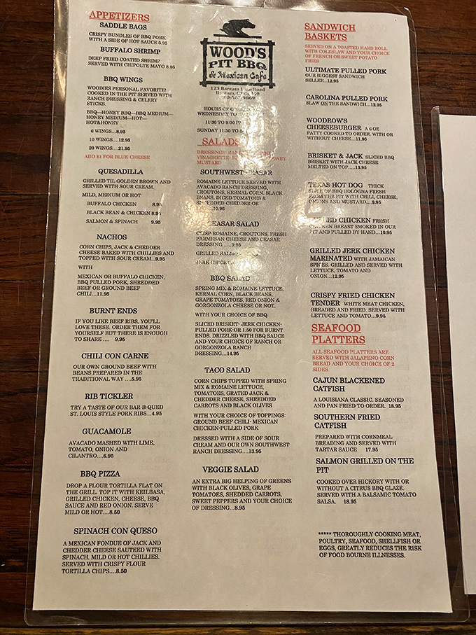 Decisions, decisions! Wood's menu is a treasure map of taste, offering everything from 'Saddle Bags' to 'Spinach con Queso'. Better come hungry!