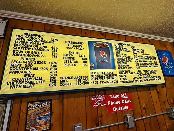 Feast your eyes on this menu masterpiece! It's like a roadmap to deliciousness, with prices that'll make your wallet smile.