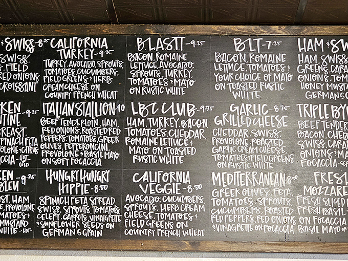Decisions, decisions! This menu board is a tantalizing roadmap to flavor town, offering a mouthwatering array of sandwiches and baked delights.