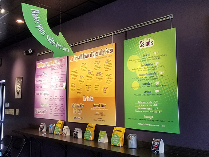 Behold, the menu of dreams! It's like a treasure map, but instead of X marking the spot, it's covered in delicious pizza possibilities.