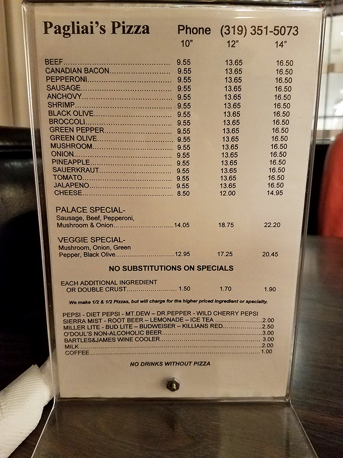 A menu that reads like a love letter to pizza. Simple, straightforward, and utterly irresistible.