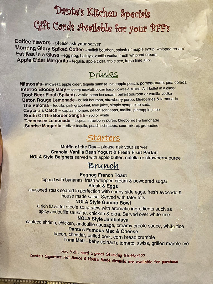 A menu that reads like a love letter to your taste buds. From "Fat Ass in a Glass" to "NOLA Style Gumbo," each item promises a flavor adventure.