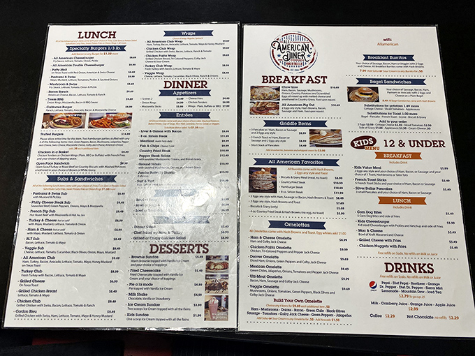 A menu that doesn't need Instagram filters &ndash; just honest food at honest prices. The laminated pages hold the roadmap to happiness, one omelet at a time.