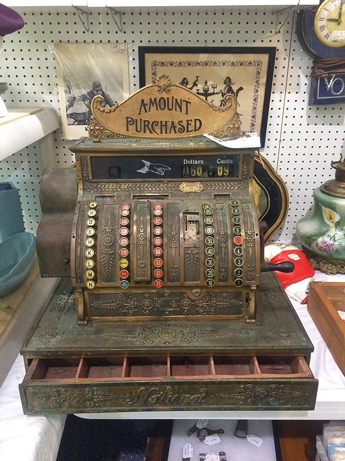 Ka-ching! This vintage cash register isn't just counting pennies; it's tallying up memories from a bygone era of retail magic.