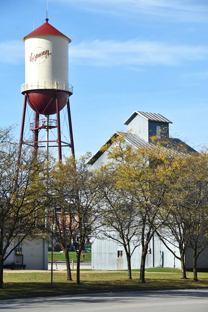 Harmony's water tower: where small-town pride meets big sky country. It's like the town's exclamation point, punctuating the landscape with a cheerful "Hello there!"