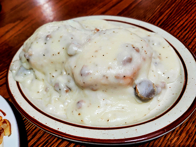 Biscuits and gravy: Where clouds meet comfort. This plate is so heavenly, it might just make you religious.