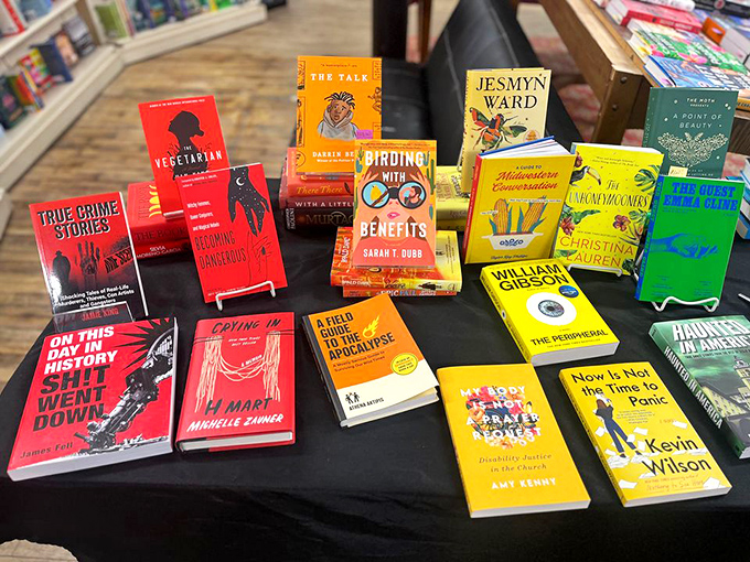 A rainbow of reading awaits! These color-coded shelves are like a literary candy store for your eyes and mind.