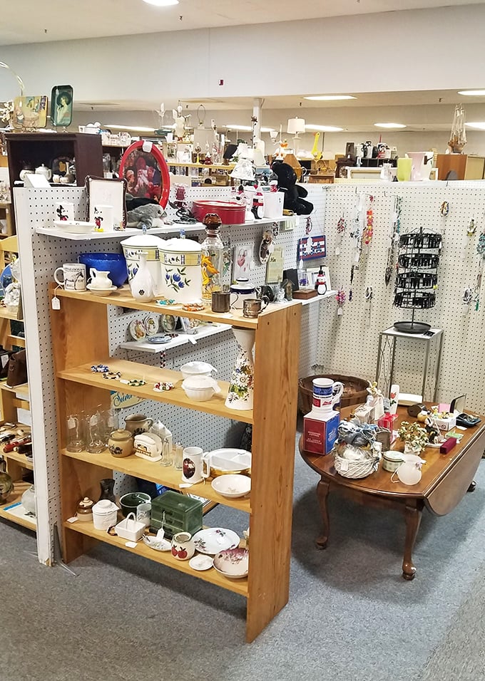Treasure hunters, prepare for sensory overload! This booth is a microcosm of American pop culture, from Mickey Mouse to vintage kitchenware.