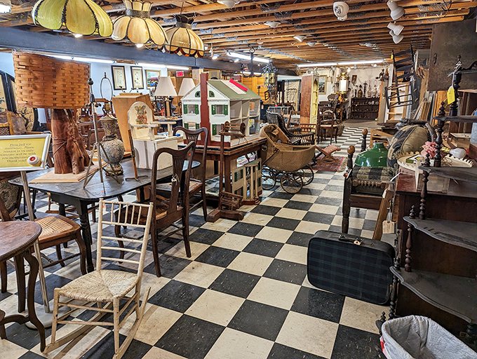 Checkerboard floors and mismatched chairs - it's like Alice in Wonderland meets your eccentric aunt's living room. Tea party, anyone?