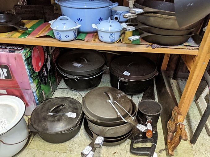 Cast iron paradise! These pots and pans have stories to tell - probably involving grandma's secret recipes and family feuds.