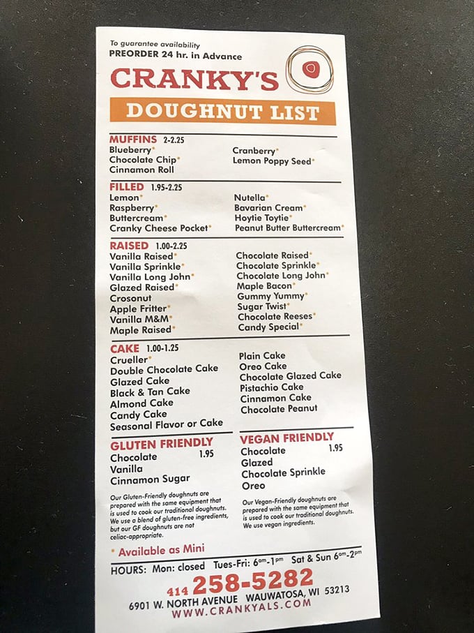 Behold, the sacred scrolls of sweetness! Cranky Al's menu is a treasure map of deliciousness. From classic glazed to wild concoctions, it's a choose-your-own-adventure of sugary bliss.