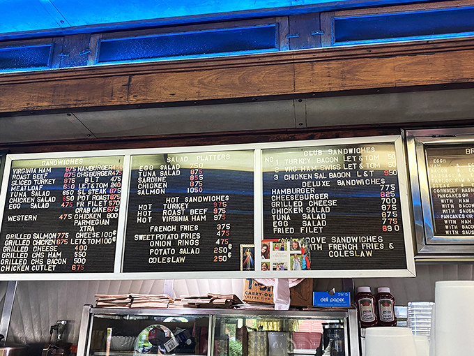 Decisions, decisions! This menu board is a roadmap to culinary bliss, with classic diner fare that'll make your taste buds do a happy dance.