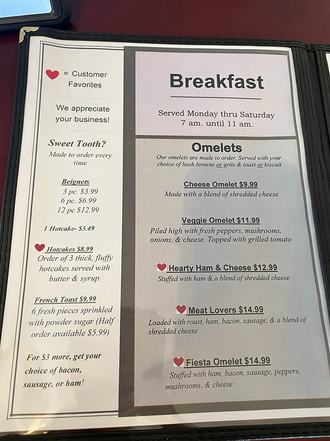 Behold, the breakfast bible! This menu is a choose-your-own-adventure of morning delights. Pro tip: Follow the hearts for customer favorites.