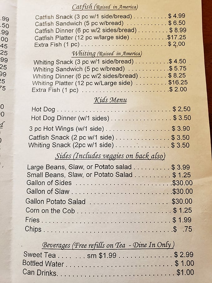 A menu that reads like a love letter to Southern comfort. Simple choices, big flavors – it's the barbecue equivalent of a greatest hits album.