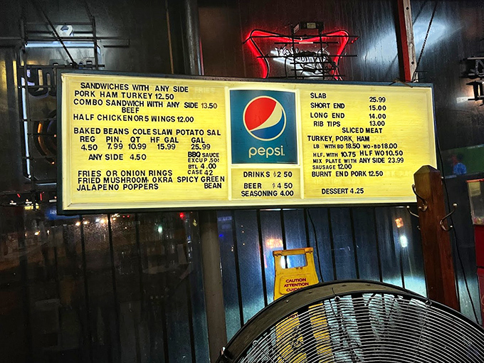 This illuminated menu board is like a treasure map to barbecue paradise, with prices that won't make your wallet weep.