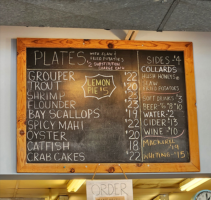 Behold, the chalkboard of dreams! Each item promises a culinary adventure that'll have you singing "Under the Sea" with newfound enthusiasm.