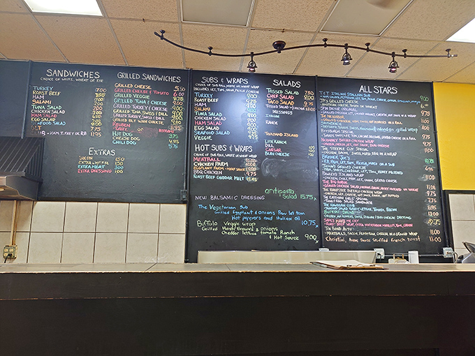 Behold, the Sistine Chapel of sandwiches! This menu board is a masterpiece of culinary possibilities that'll make your head spin.