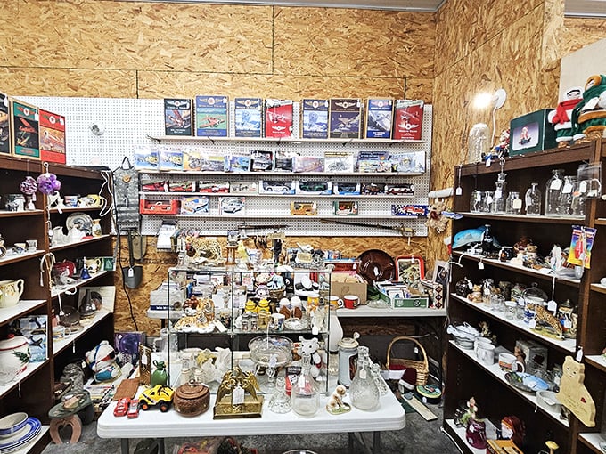 A collector's fever dream where vintage model cars share shelf space with delicate glassware. My wallet is already sweating.