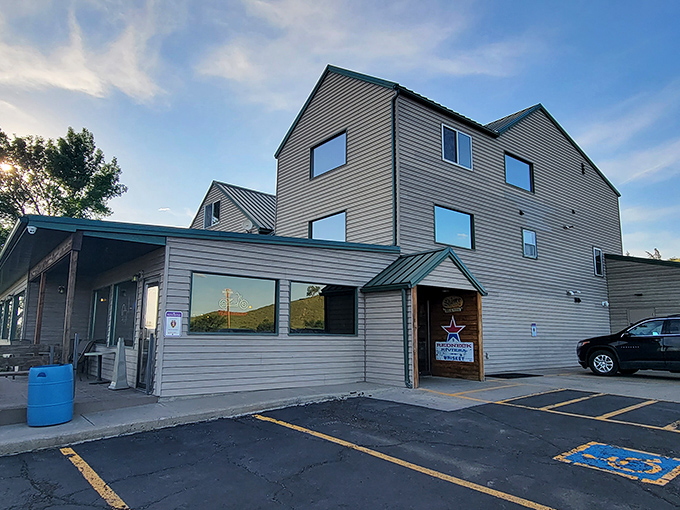 Cattleman's Club: Where even the sculpture has a beef with vegetarians. This metal bison means business!
