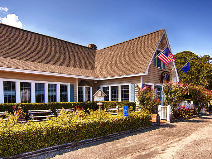 Cottage chic meets seafood central. This charming yellow facade is your gateway to a world of maritime flavors.