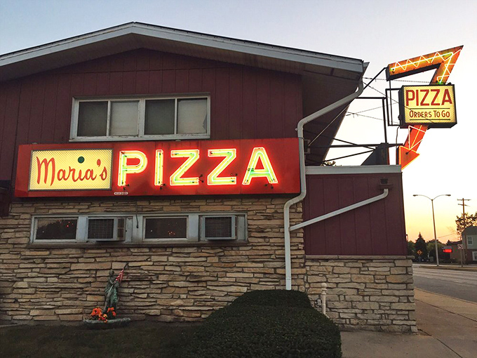 Maria's Pizza: Time travel never tasted so good. This retro sign is your portal to a world where pizzas are big, calories don't count, and neon never went out of style.