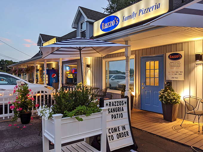 Razzo's Family Pizzeria: Where "Sangria Patio" isn't just a sign, it's a lifestyle. It's like your cool aunt opened a pizzeria &ndash; comfy, quirky, and always a good time.