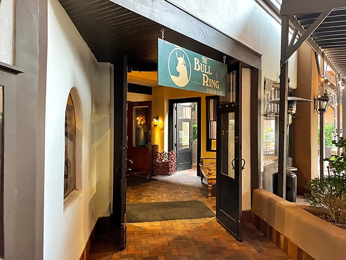 The Bull Ring: Where steaks and sophistication collide! This entrance whispers, "Come in for the beef, stay for the ambiance." It's the James Bond of steakhouses.